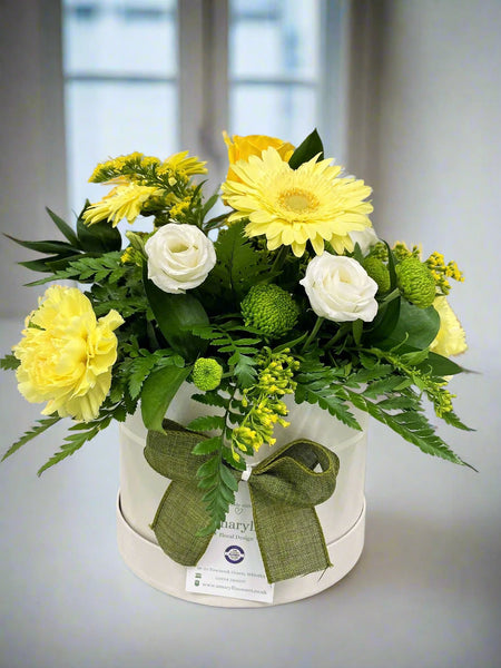 Hat Box Flower Arrangements -(Yellow Tones) -from – Amaryllis Floral Design